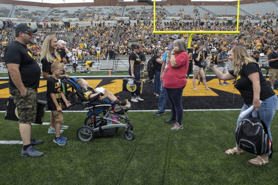 A heart for the Hawks: Kid Captain leads the way to the Holiday bowl ...