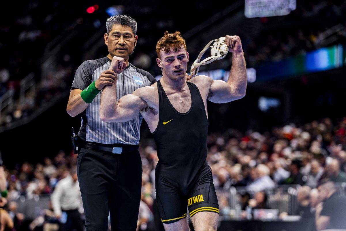 Iowa men's wrestling advances three to semifinals in Session III of ...